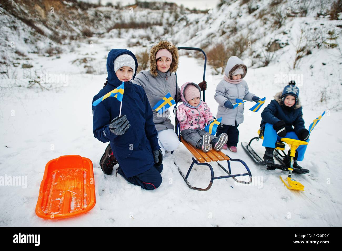 Scandinavian family with Sweden flag in winter swedish landscape Stock ...
