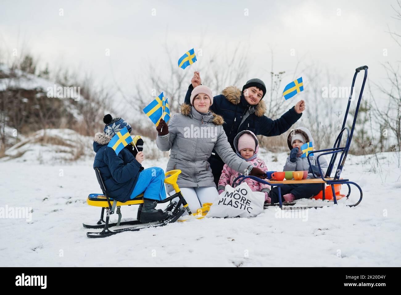 Scandinavian family with Sweden flag in winter swedish landscape Stock ...