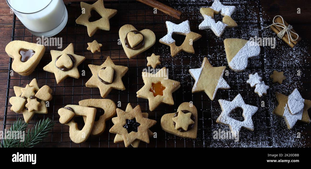 Christmas cookies. Biscuits with shortcrust pastry on wooden background ...