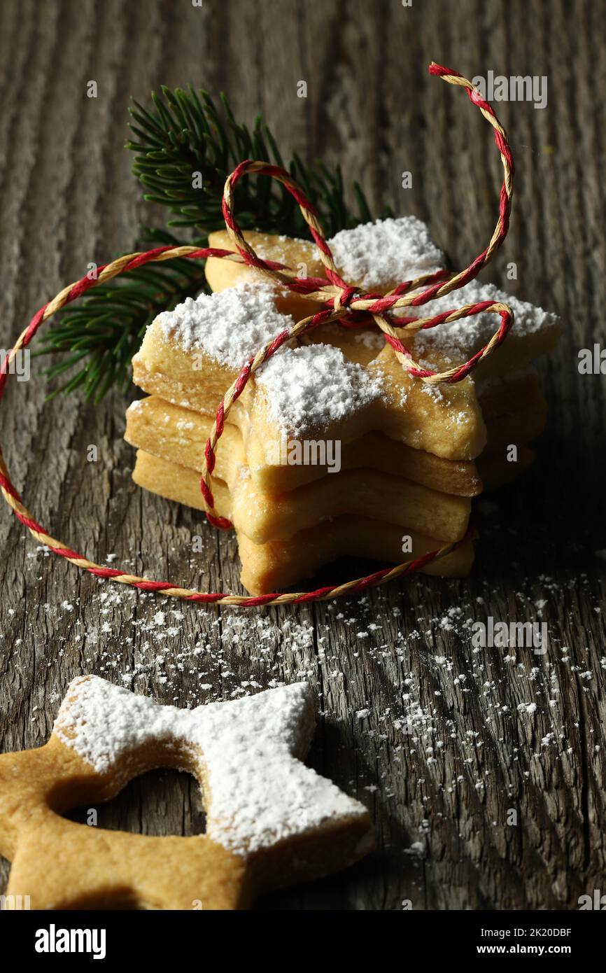 Christmas cookies. Biscuits with shortcrust pastry on wooden background ...