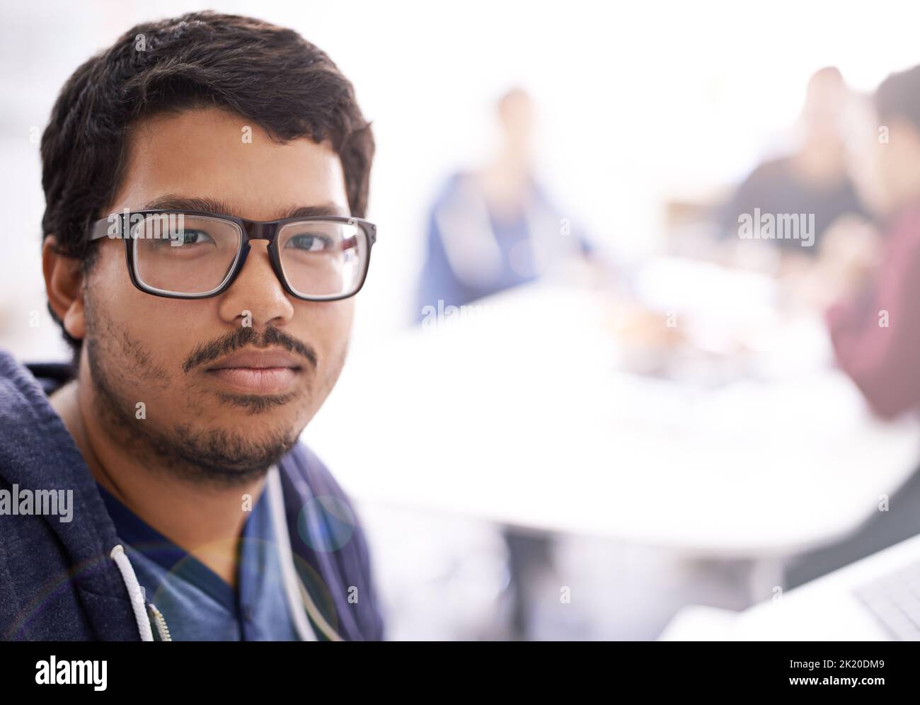 When the going gets tough call a programmer. Portrait of a young ...