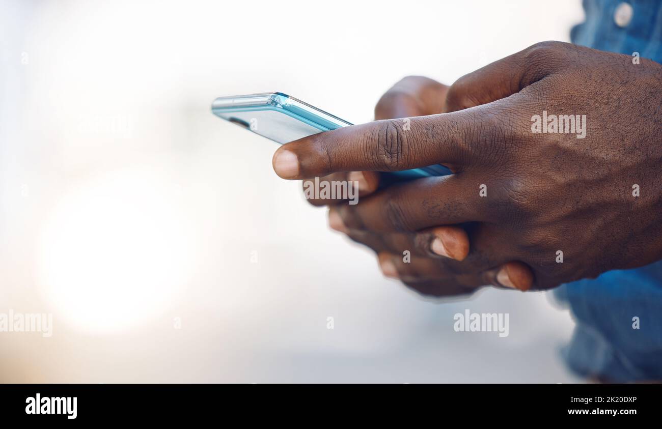 Guy scrolling on phone hi-res stock photography and images - Alamy