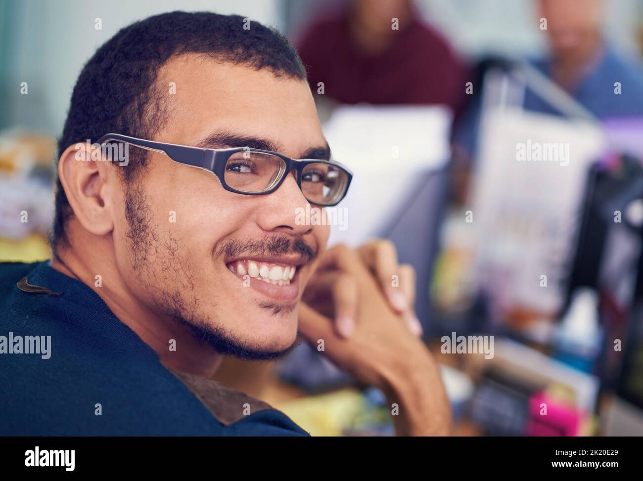 Im the programmer you need. a handsome young programmer at work Stock ...