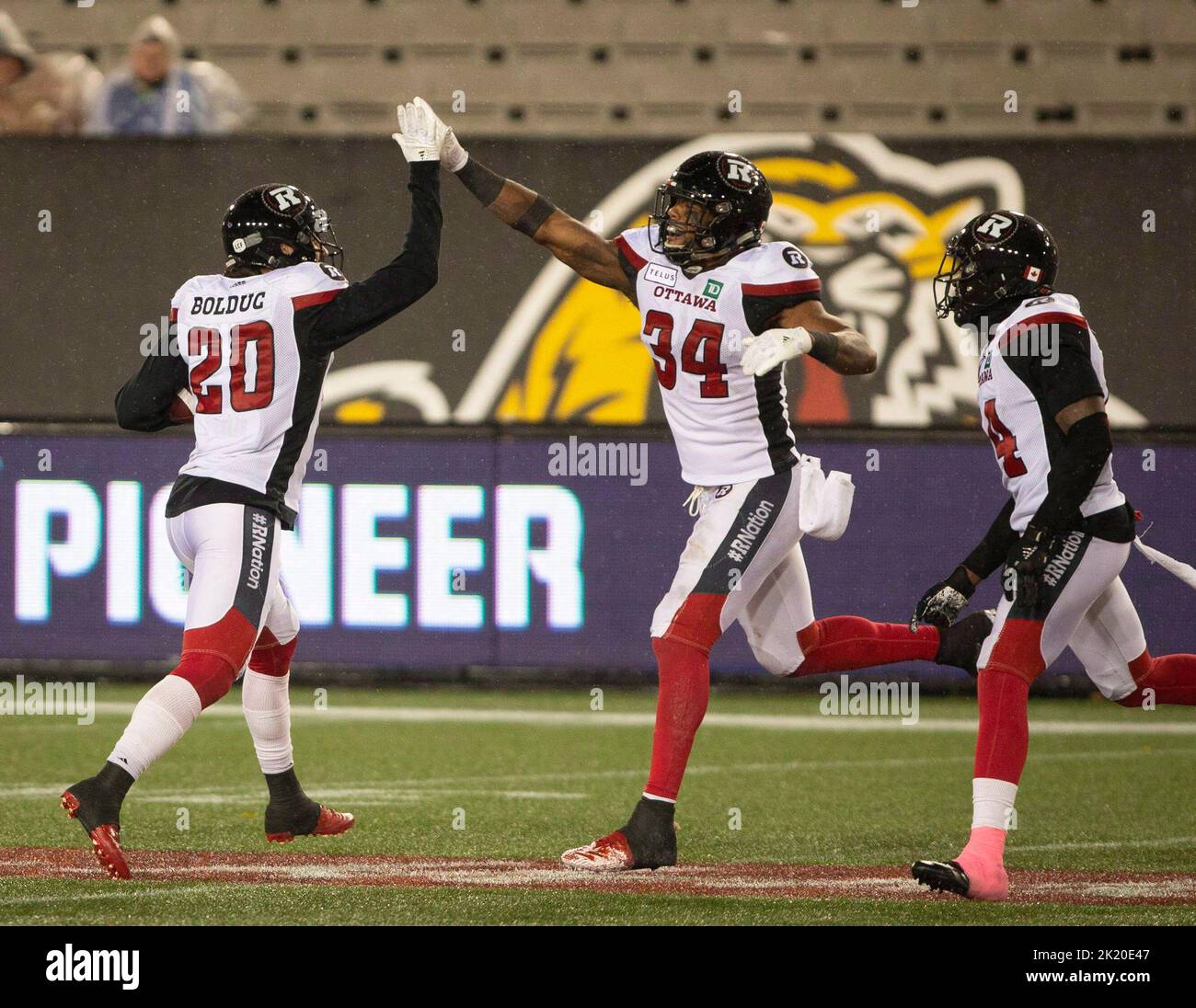 Ottawa Redblacks Kyries Hebert (34) celebrates with teammate Jean ...
