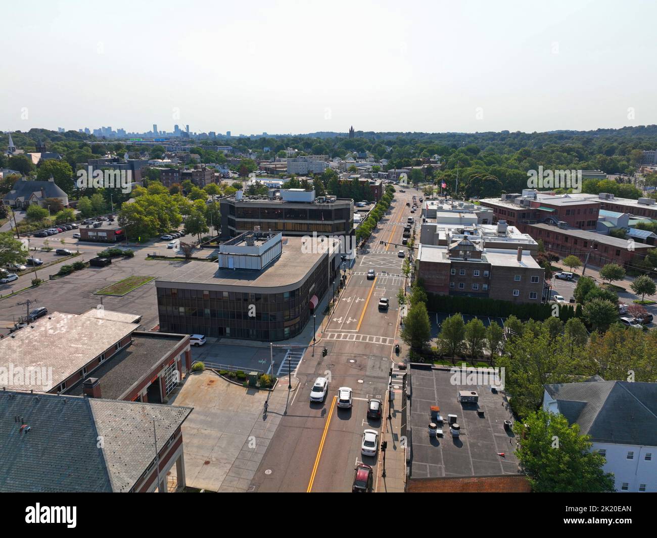 Watertown Main Street aerial view with Boston modern city skyline at ...