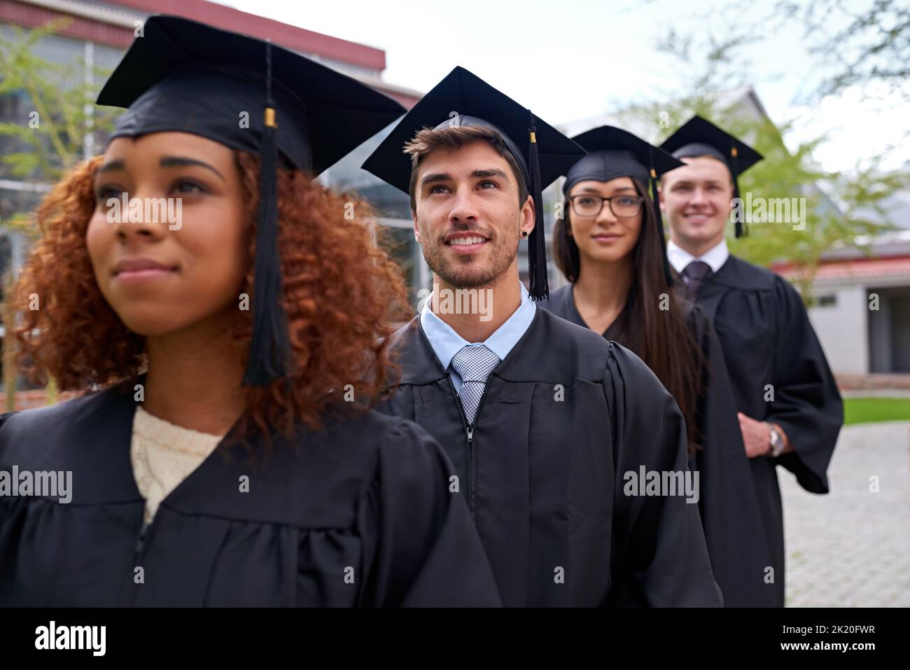 Young man graduating outside hi-res stock photography and images - Alamy
