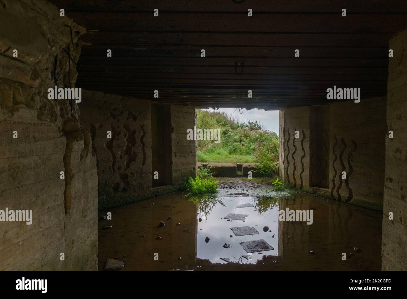 Inside an empty german bunker of the Second World War, remains of the ...