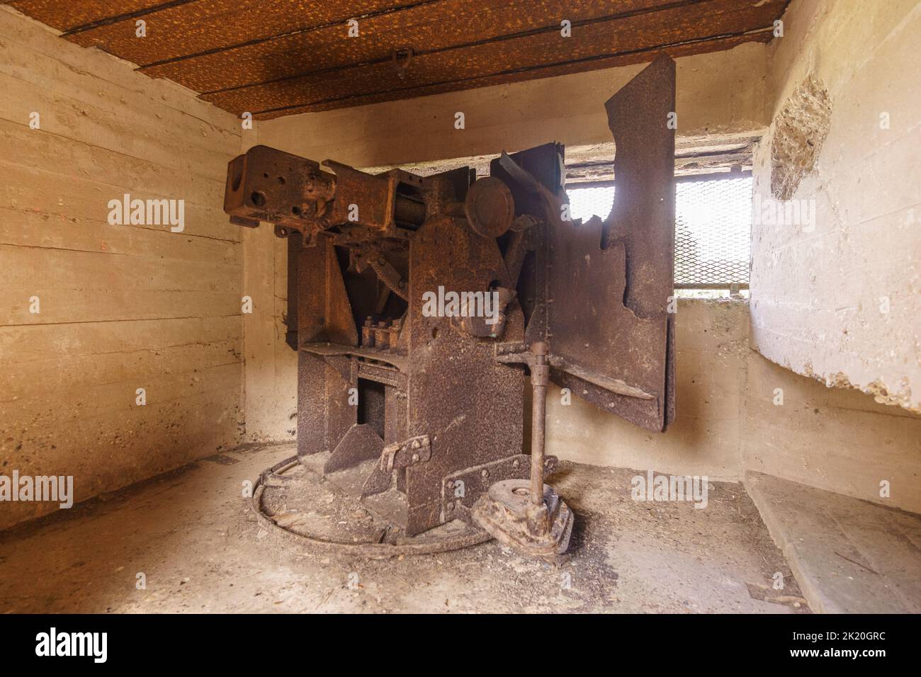 Old rusty german World War 2 gun in bunker at Omaha Beach, Normandy ...