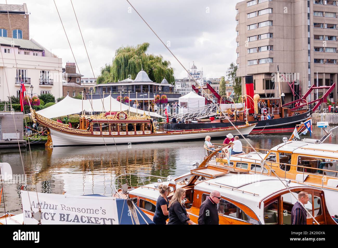 Royal Rowbarge Gloriana moored in St. Katherines Dock near Tower Bridge ...