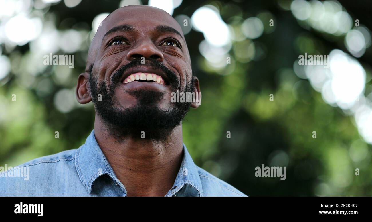 Man looking sky feeling hopeful hi-res stock photography and images - Alamy