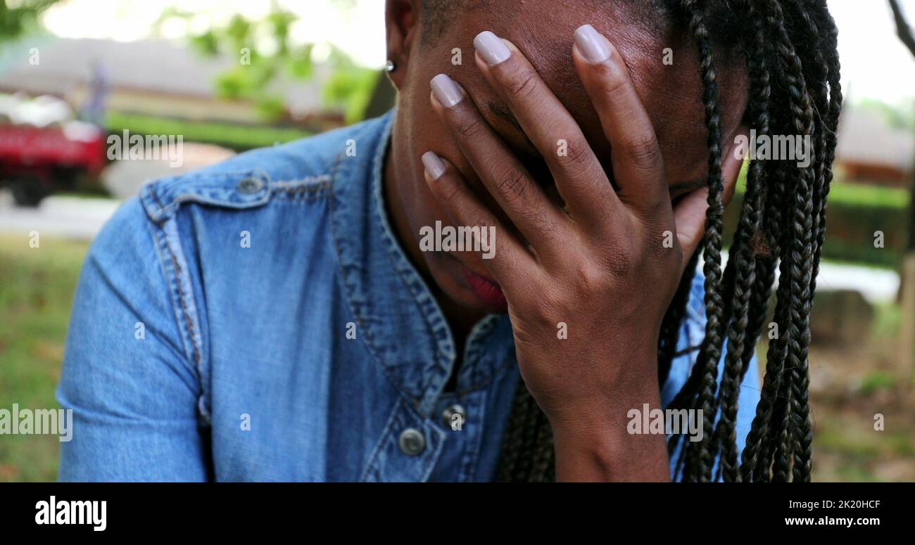 Black woman feeling regret emotion, depressed person Stock Photo - Alamy