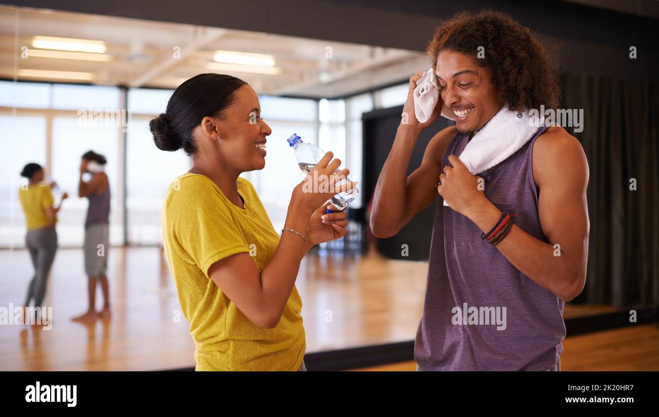 Working together towards a perfect performance. two young people ...