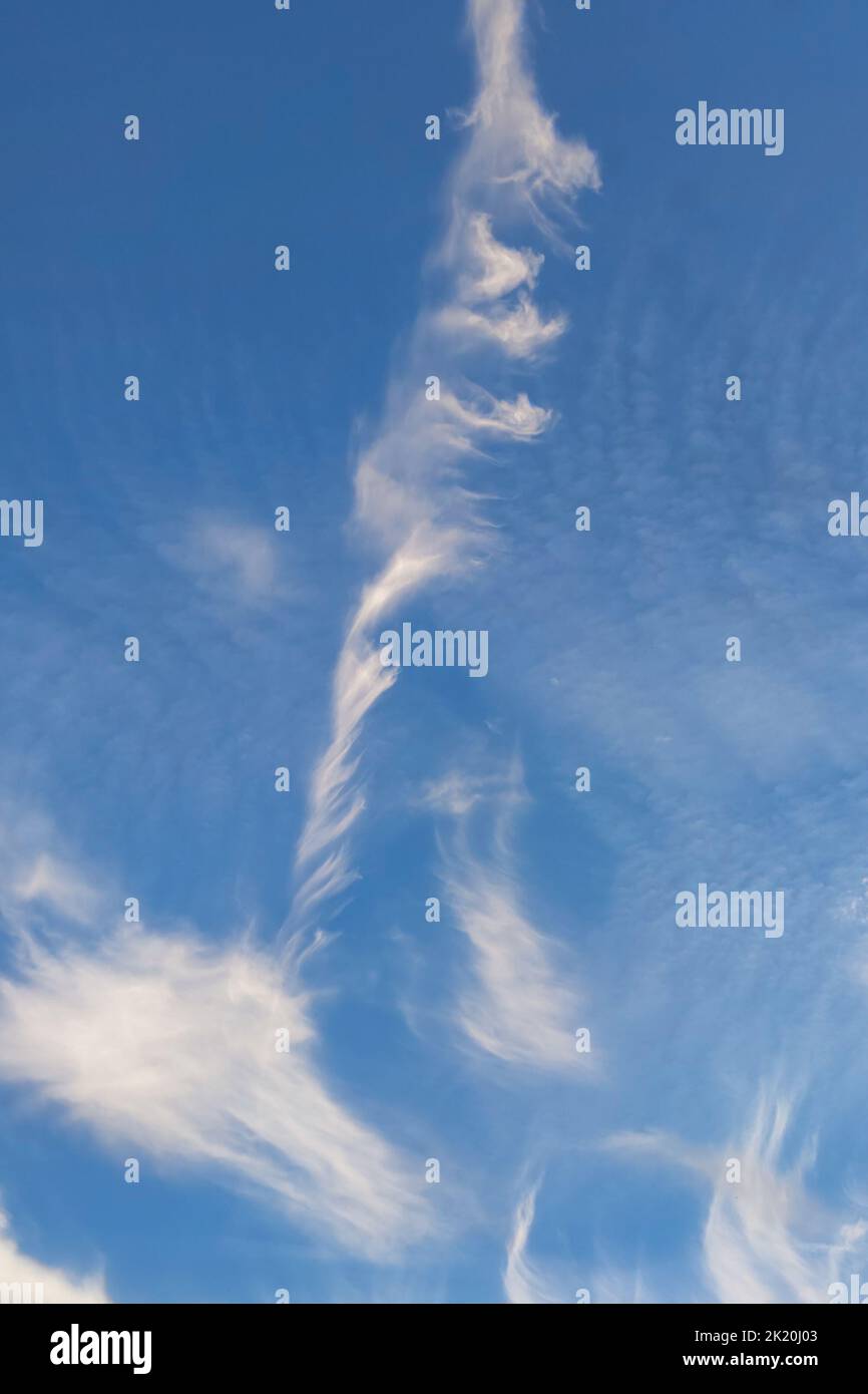 Cirrus cloud streak is blown away by the strong current high in the ...