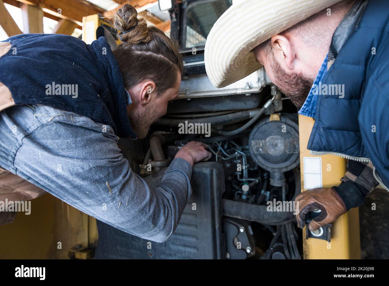 Young mechanic tractor hi-res stock photography and images - Alamy