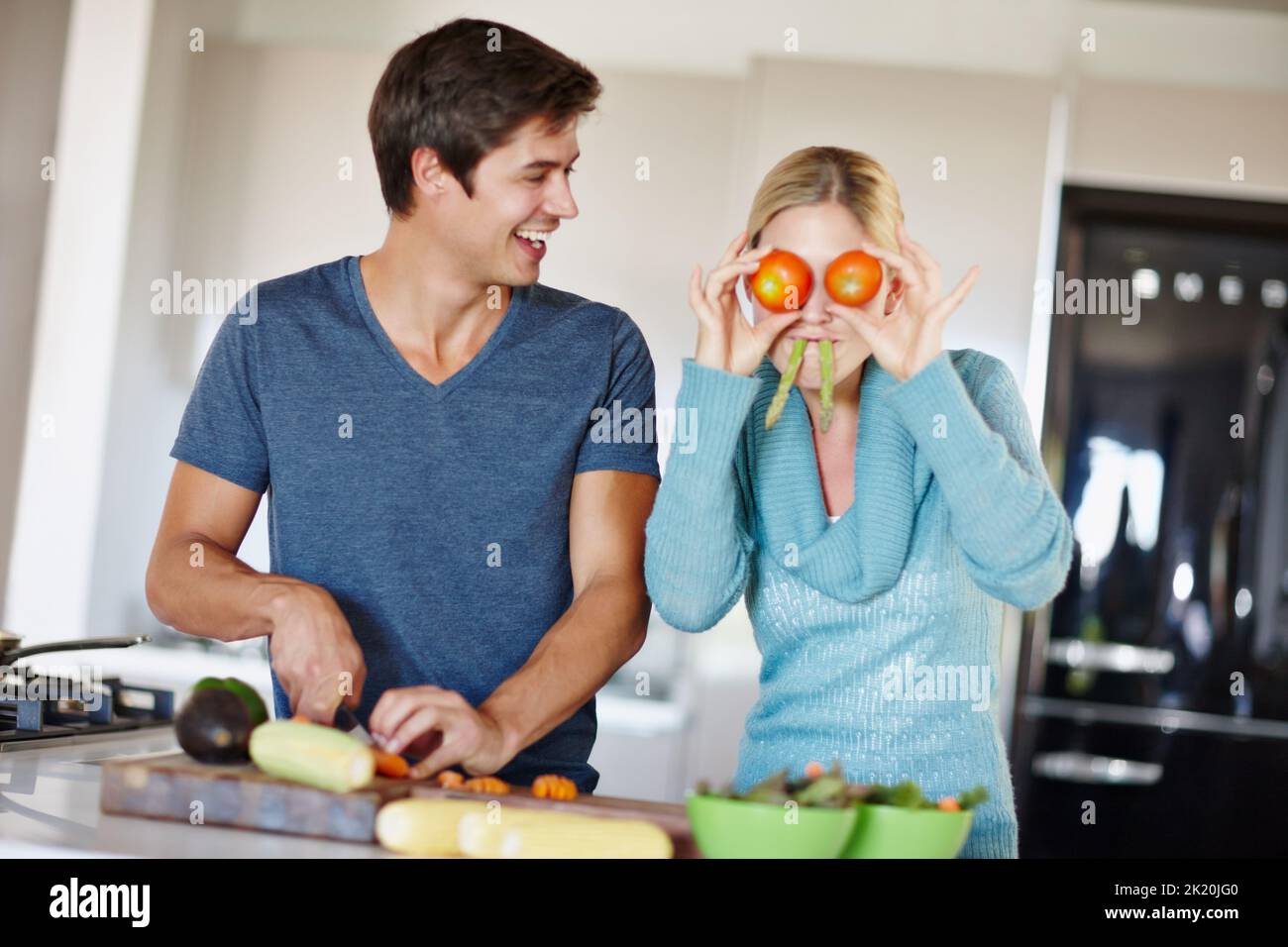 When you enjoy your food, you enjoy your life. a playful young woman ...