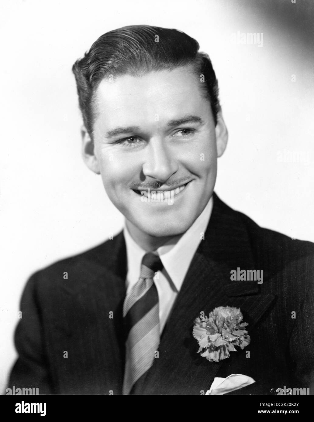 ERROL FLYNN 1938 Portrait publicity for Warner Bros Stock Photo - Alamy