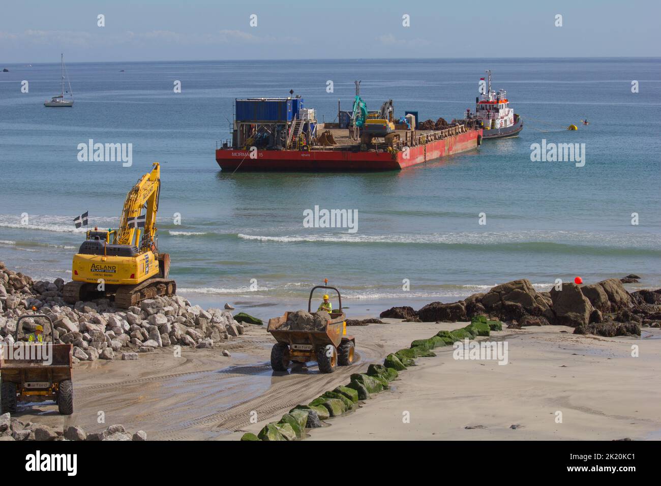 Transport barge after offloading armour rocks for breakwater ...