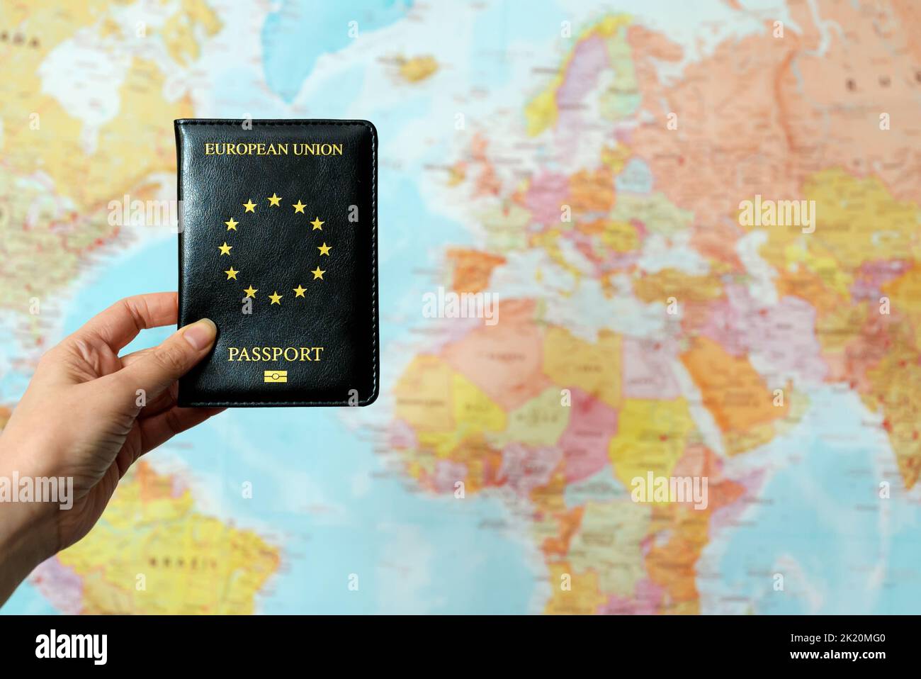 European Union passport in front of world map Stock Photo - Alamy