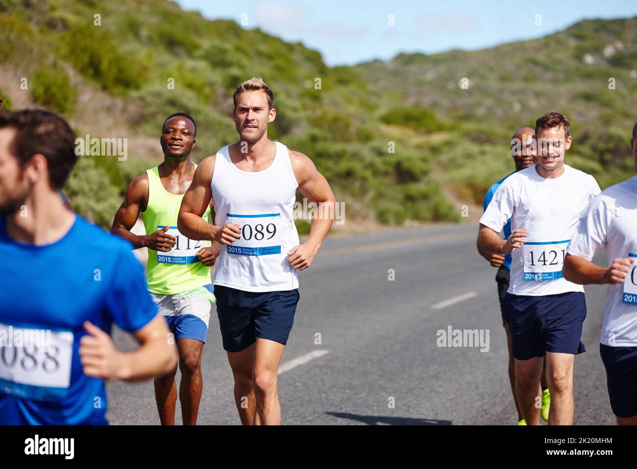 Get your blood pumping... run a marathon. a group of young men running ...