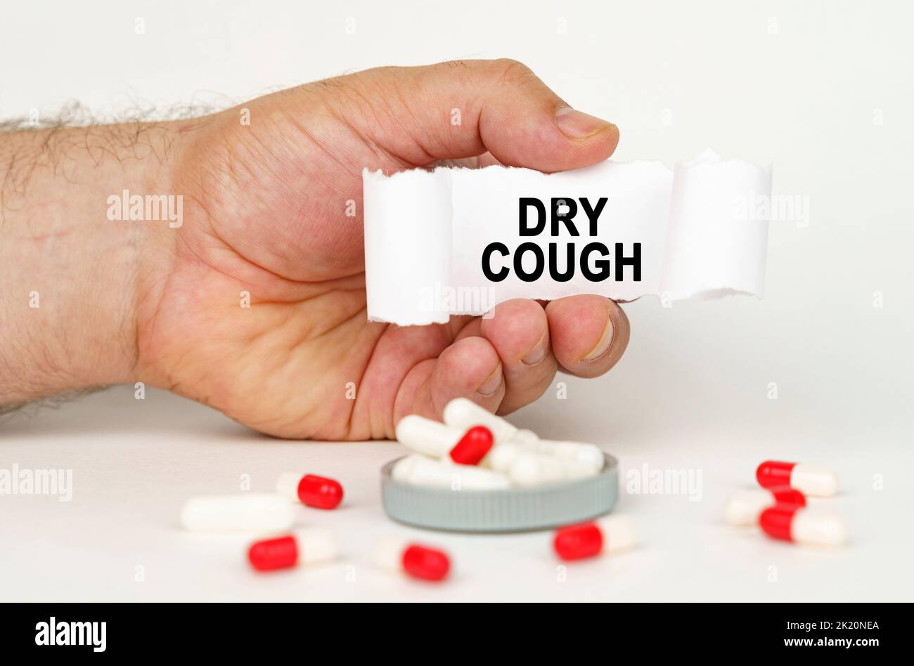 Medical concept. On a white background, medical capsules, in the hands ...