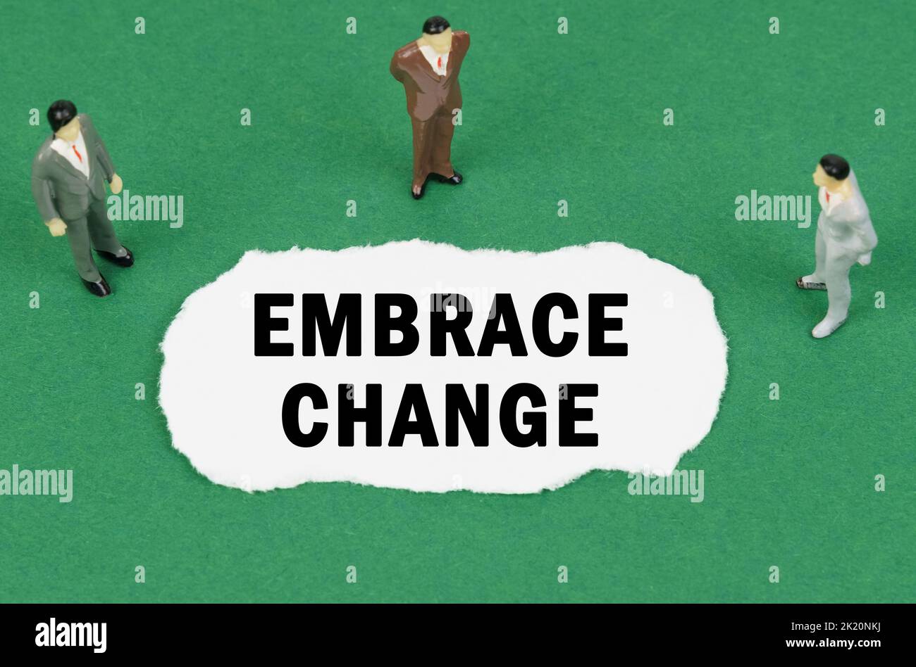 Business and finance concept. On the green surface there are figures of ...