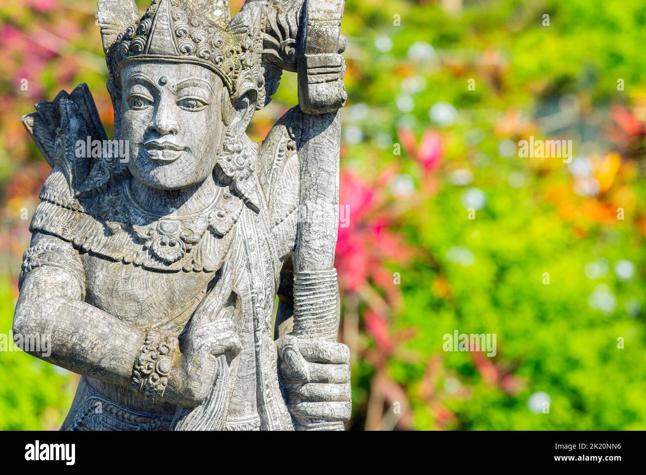 Traditional demon guards statue carved in stone in Bali island Stock ...
