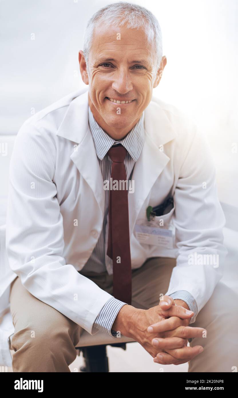 Your health is my number one priority. Portrait of a smiling male ...