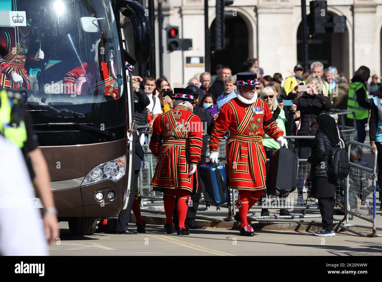 Beefeaters make their way into Westminster Hall after getting off a ...