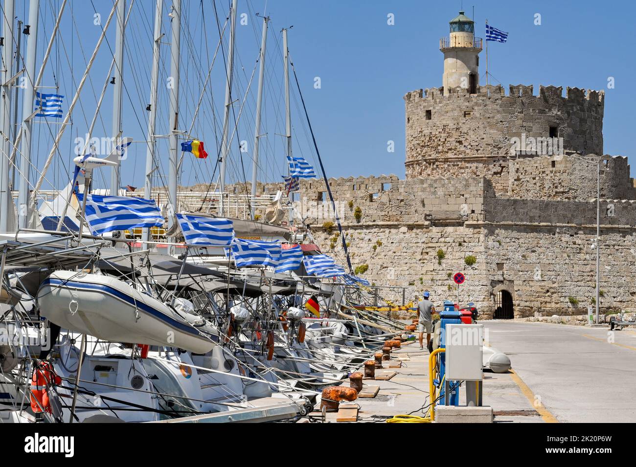 Rhodes, Greece - May 2022: Greek national flag flying on yachts moored ...