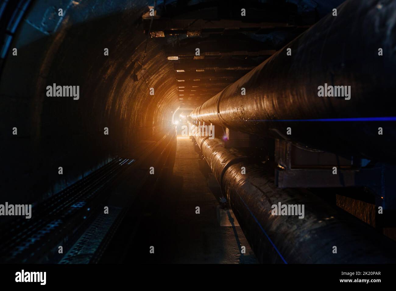 Round concrete underground tunnel of sewer, heating duct or water ...