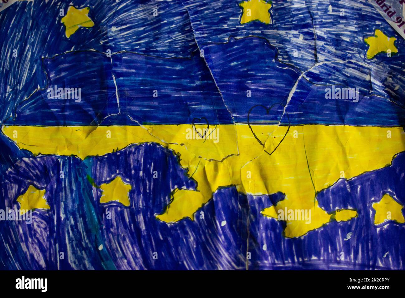 Madrid, Spain. May 1, 2022 drawing of yellow blue map of Ukraine ...
