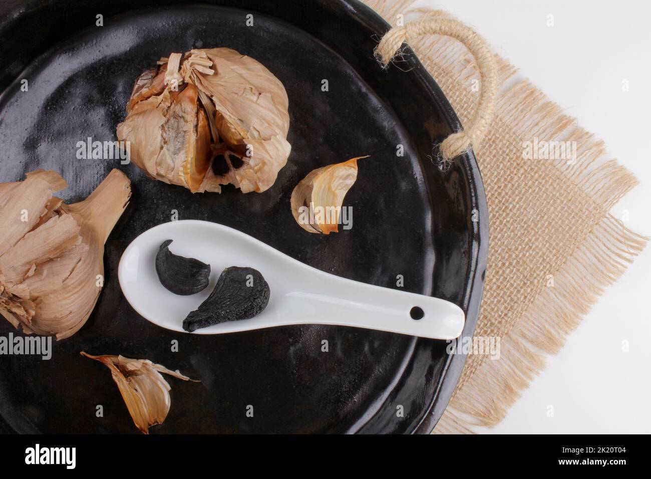 Black garlic made by fermenting process. Fermented foods. Healthy food ...