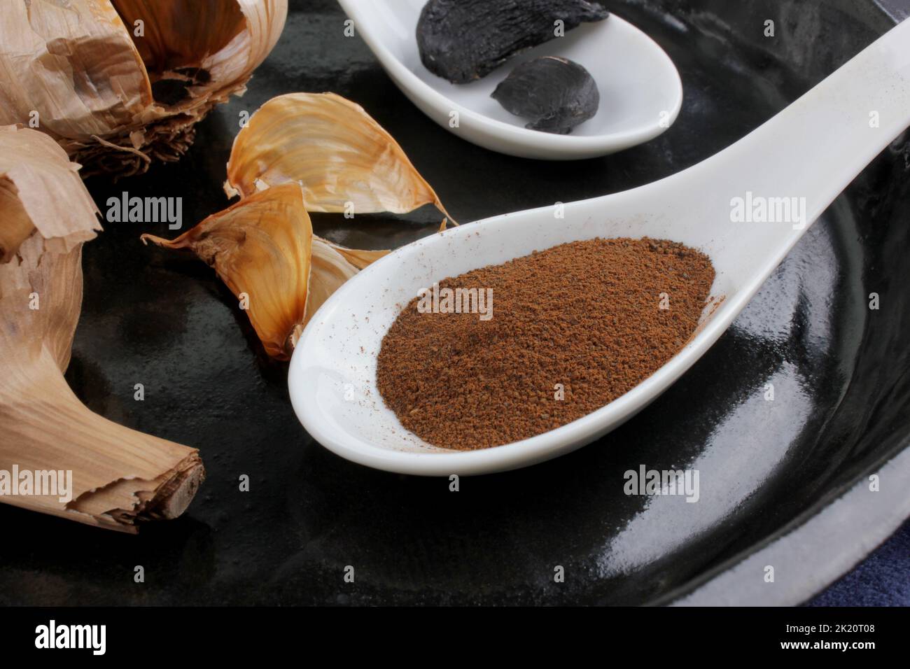 Black garlic made by fermenting process. Fermented foods. Healthy food ...