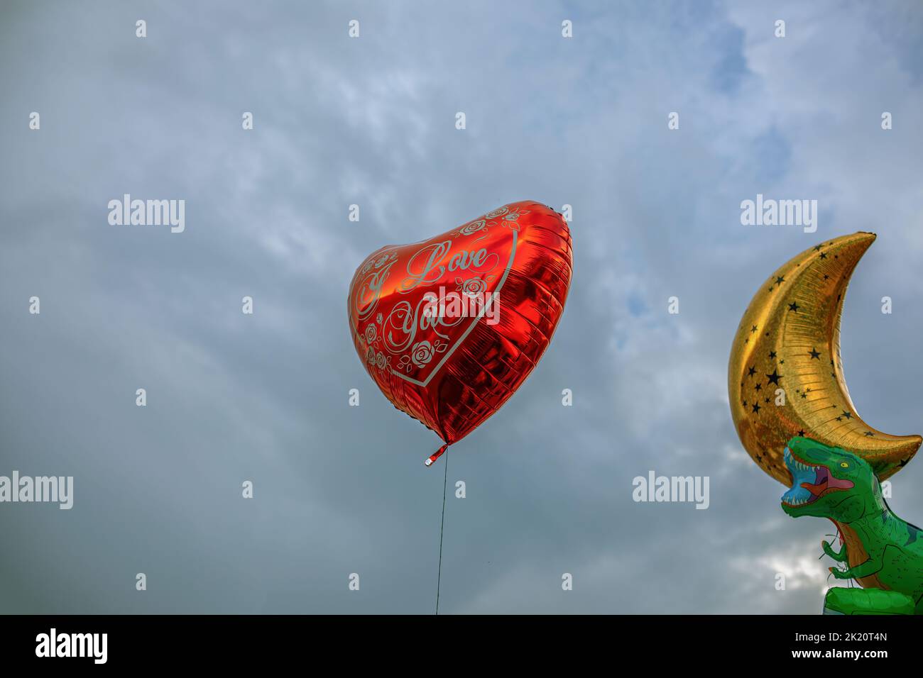 Heart balloon shot against the sky. High quality photo Stock Photo - Alamy