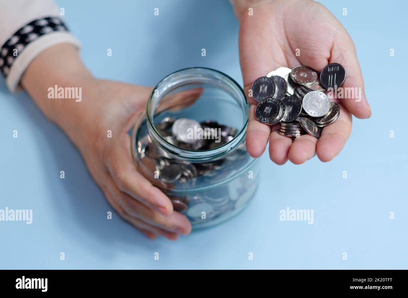 Old person counting coins hi-res stock photography and images - Alamy