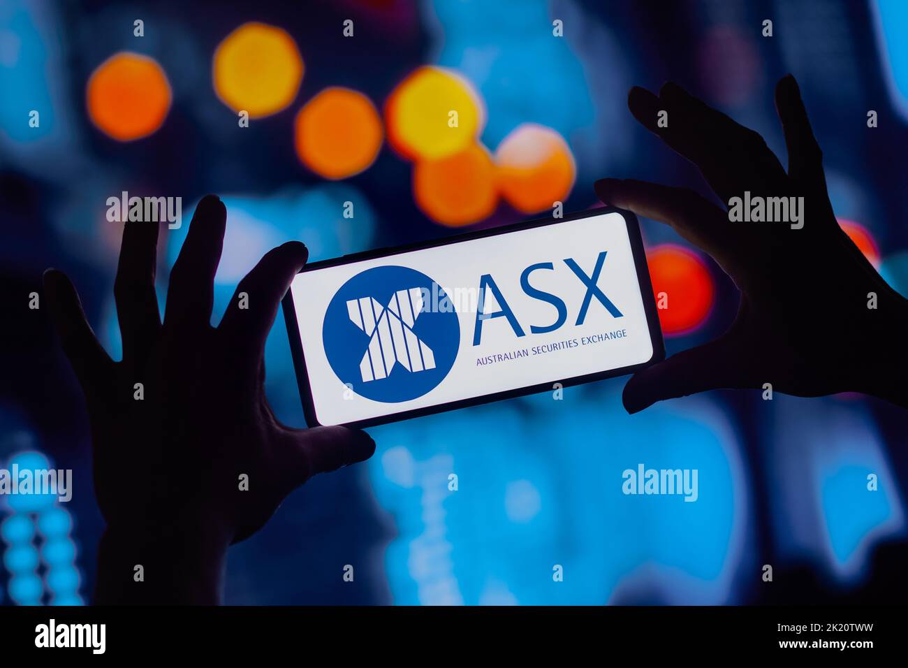 In this photo illustration, the Australian Stock Exchange (ASX) logo ...