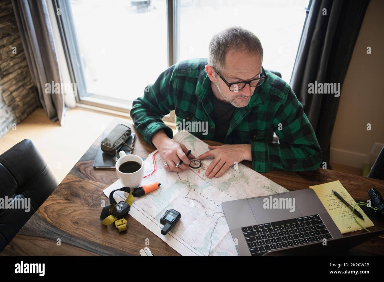 Planning vacation laptop map hi-res stock photography and images - Alamy