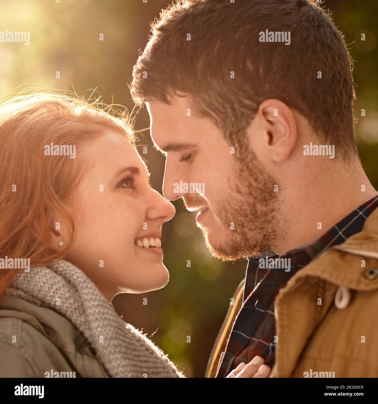 My lips are dying to meet yours. a happy young couple getting lost in ...