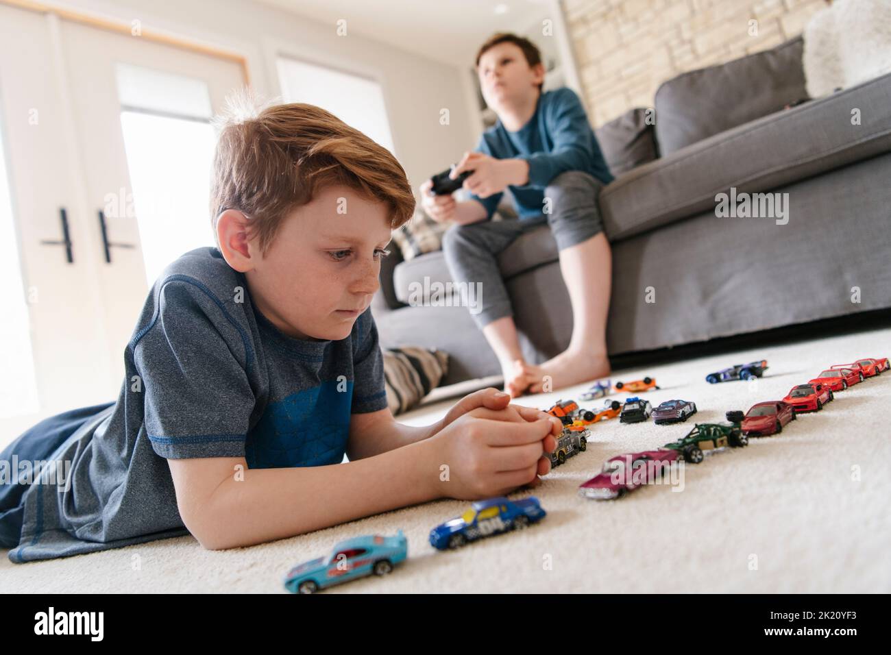 Boy play on floor hi-res stock photography and images - Alamy