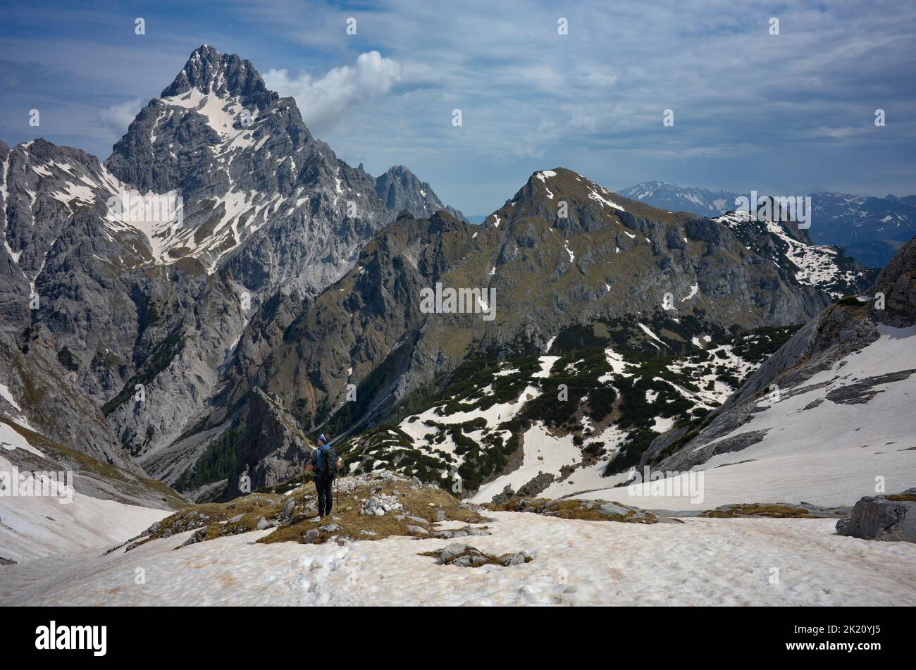 hiker at Berchtesgaden national park in spring with view of Mt ...