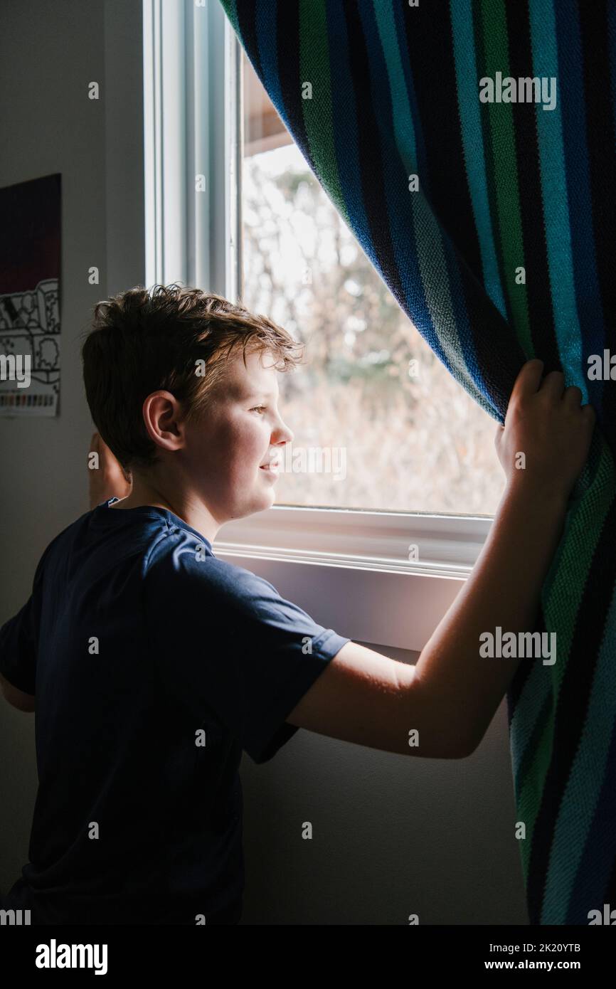 Window curious hi-res stock photography and images - Alamy