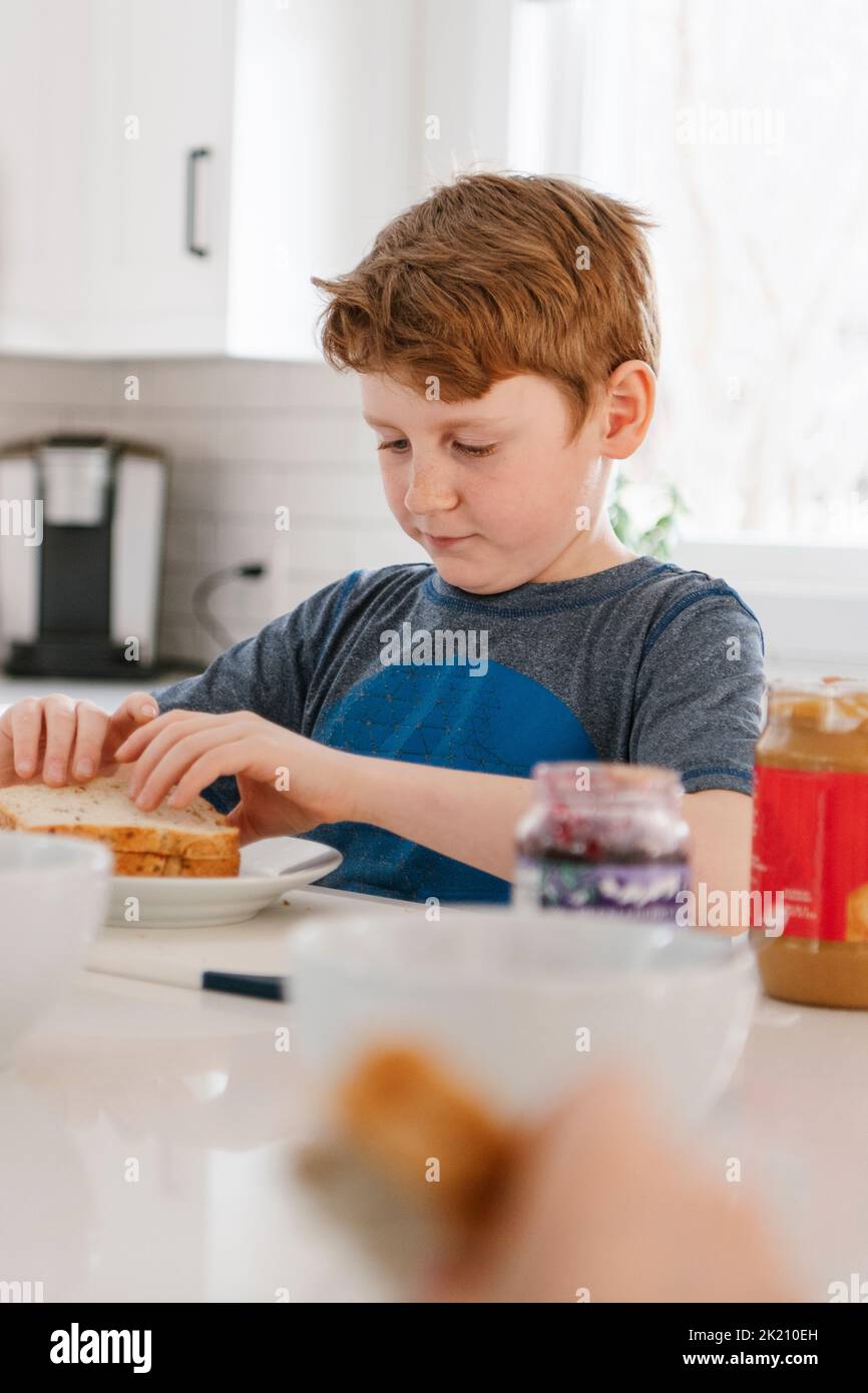 Boy eat sandwich hi-res stock photography and images - Alamy