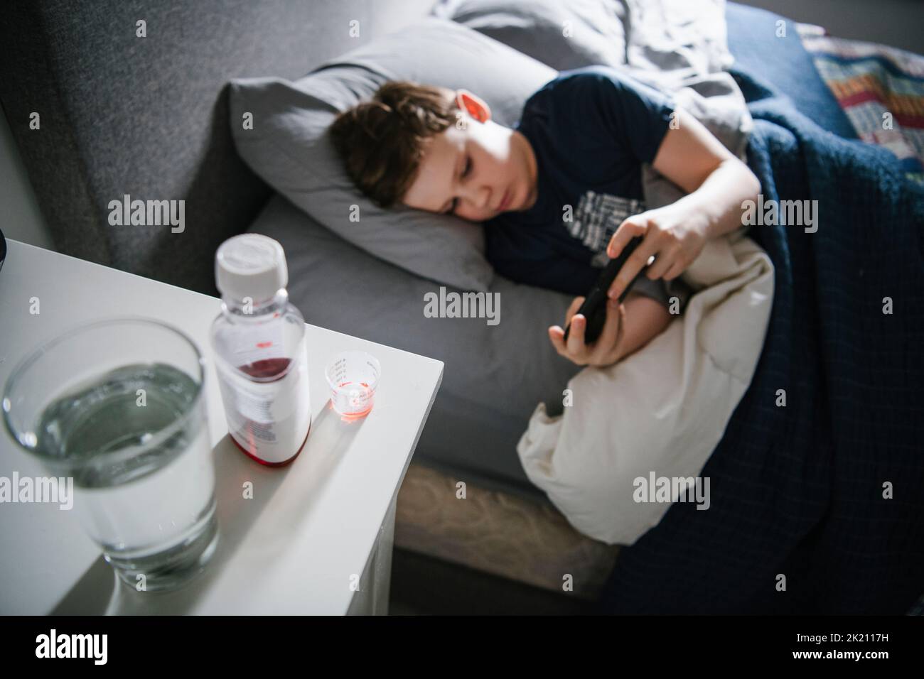 Bed person sick mobile phone hi-res stock photography and images - Alamy