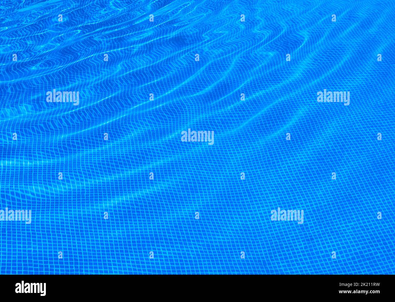 Chilling by the pool Stock Photo - Alamy