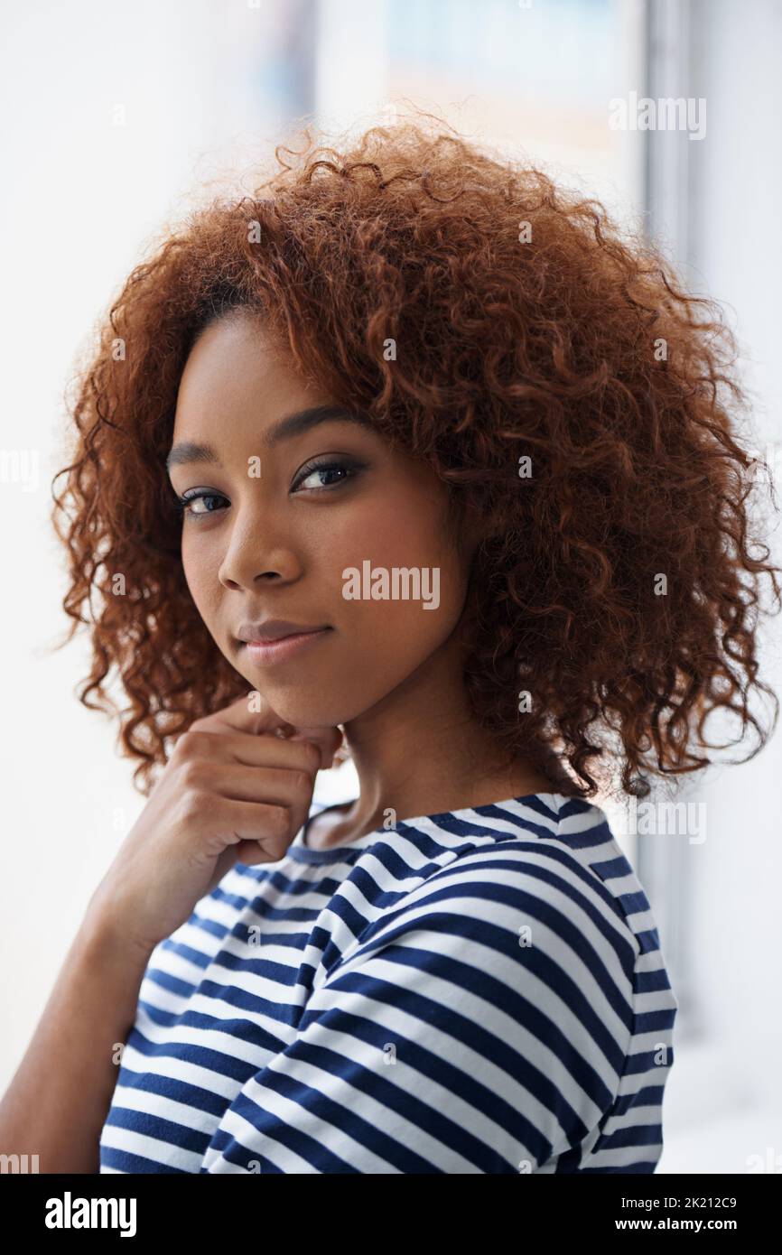 I aim only for the top. a young woman at work in an office Stock Photo ...