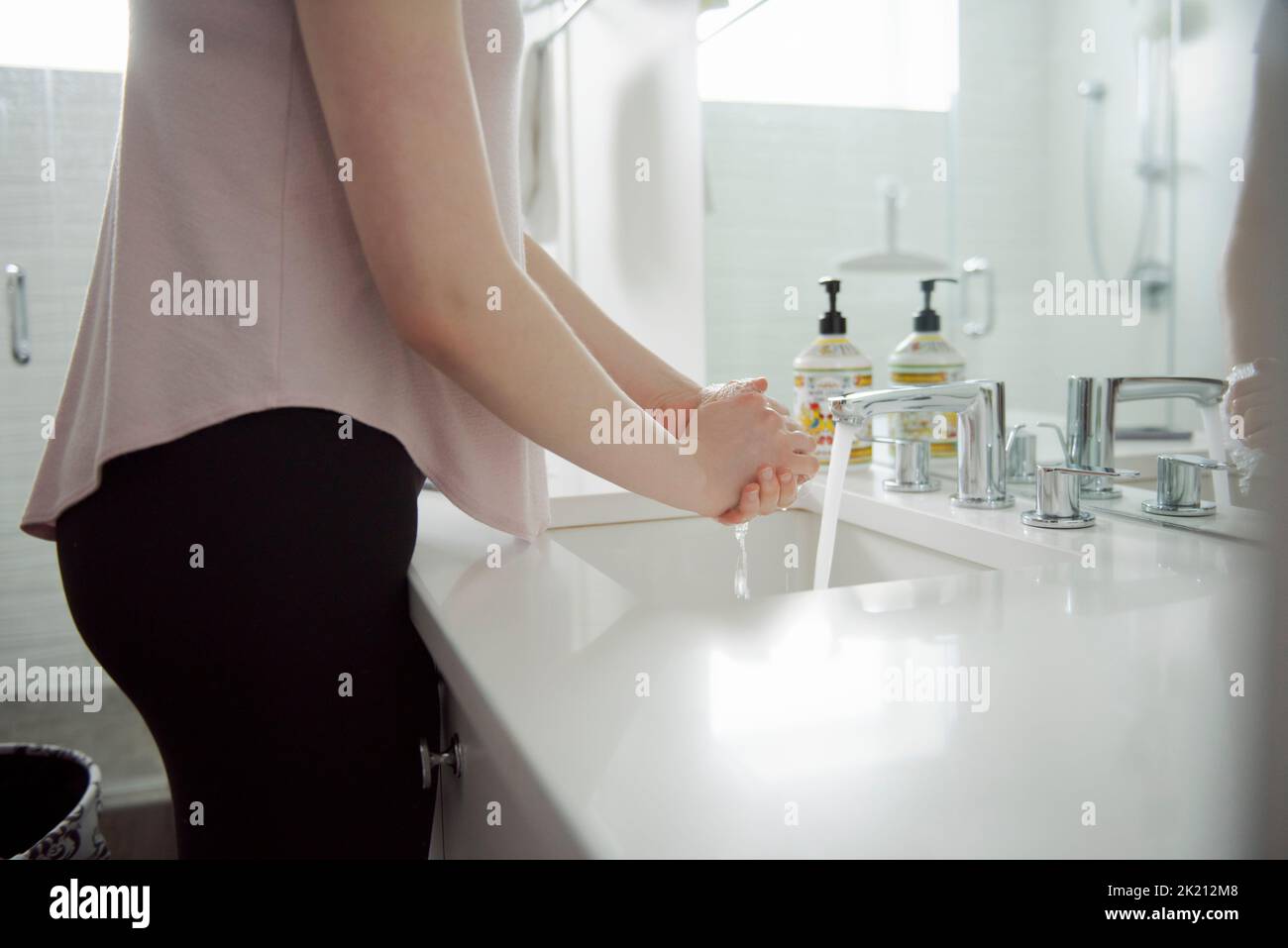 Teen washing hands hi-res stock photography and images - Alamy