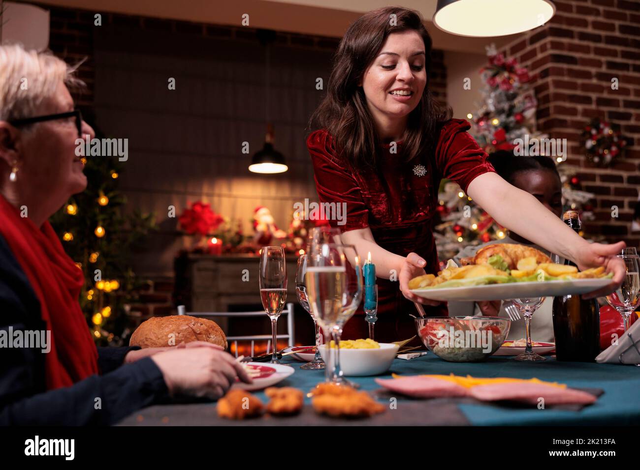 Diverse family gathering dining hi-res stock photography and images - Alamy