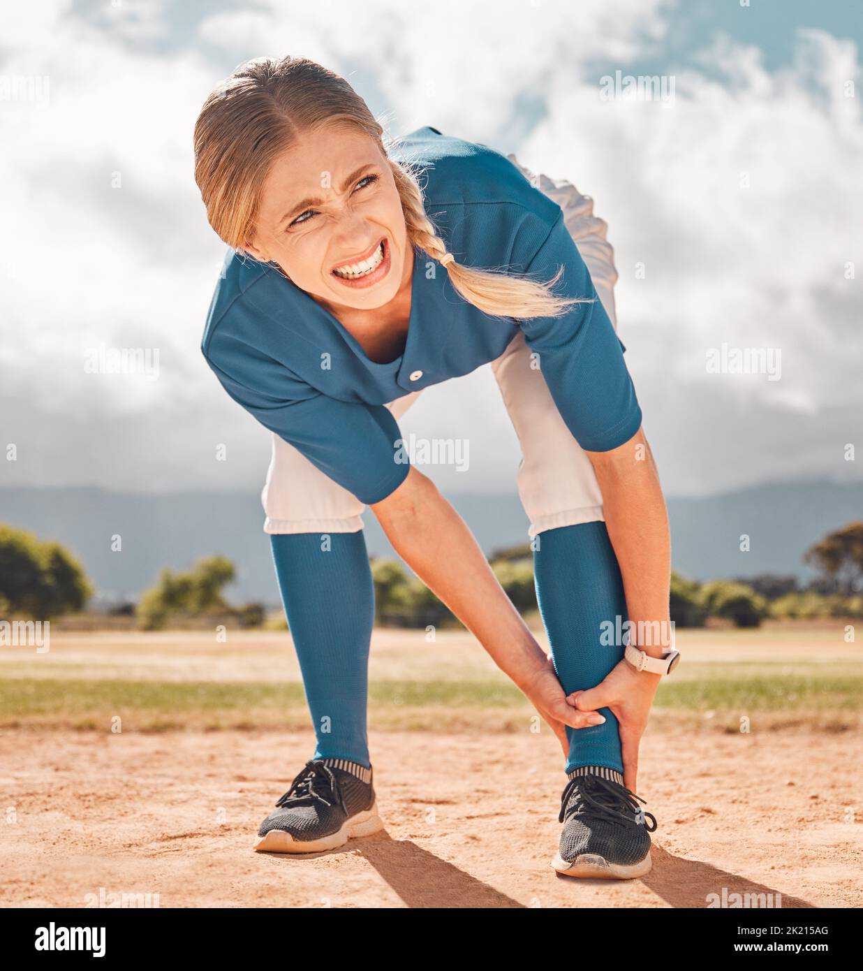 Sports, pain and woman with leg injury on baseball pitch alone. Fitness ...