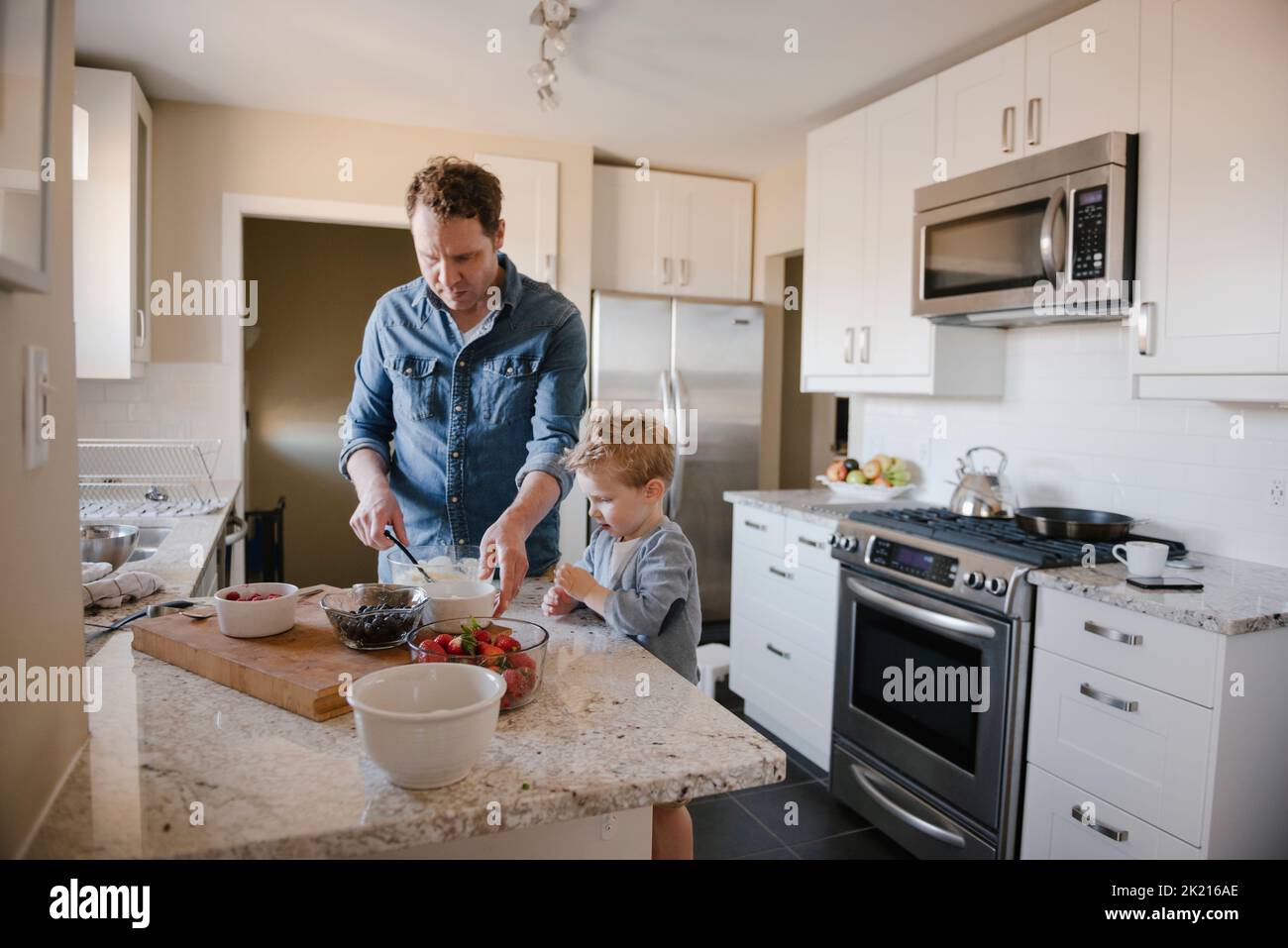 Boy in the kitchen hi-res stock photography and images - Alamy