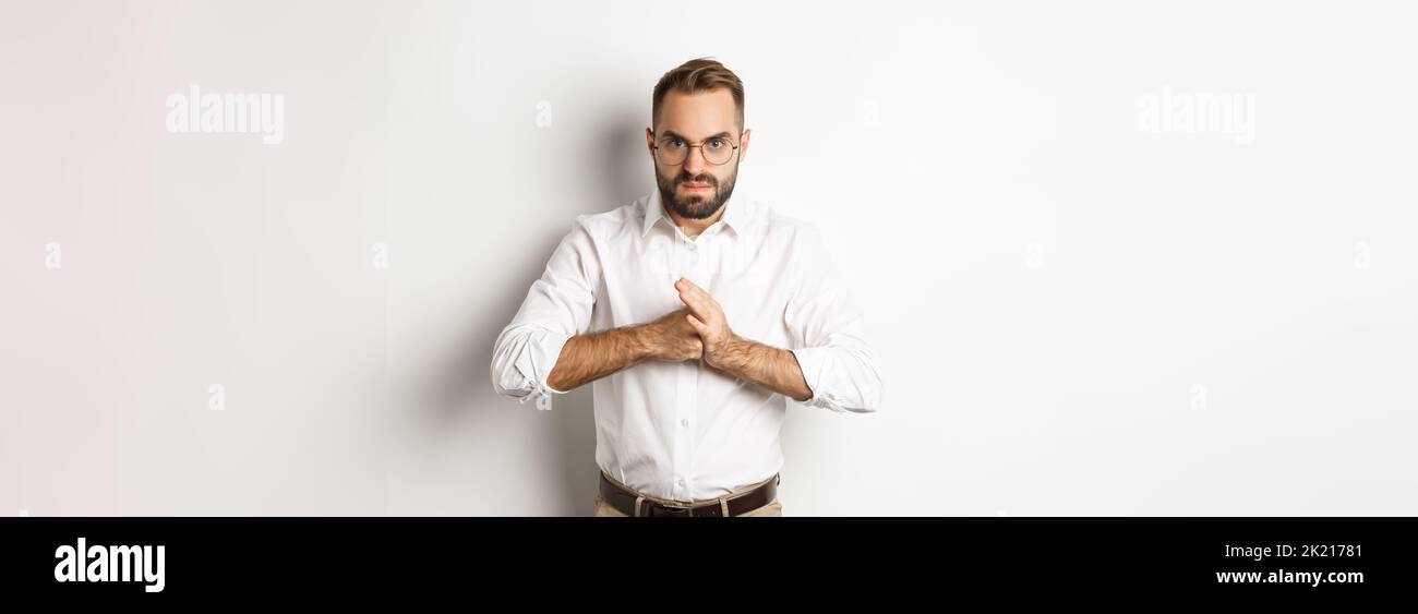Angry man crack knuckles, want to punch someone, standing mad against ...